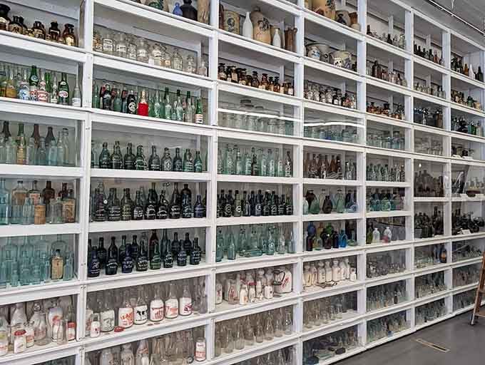 Floor-to-ceiling shelves packed with thousands of bottles create a mesmerizing glass rainbow that goes on forever.