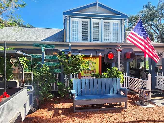 That blue porch bench and American flag combo screams "authentic Florida" louder than any tourist brochure ever could.
