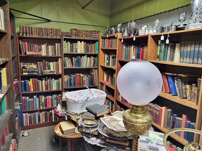 Books and baubles living together in perfect harmony, like a library met a flea market and they fell in love.