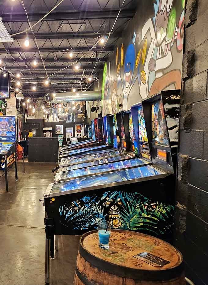 Rows of gleaming pinball machines stand ready like soldiers of fun, waiting to devour your afternoon and loving every minute.