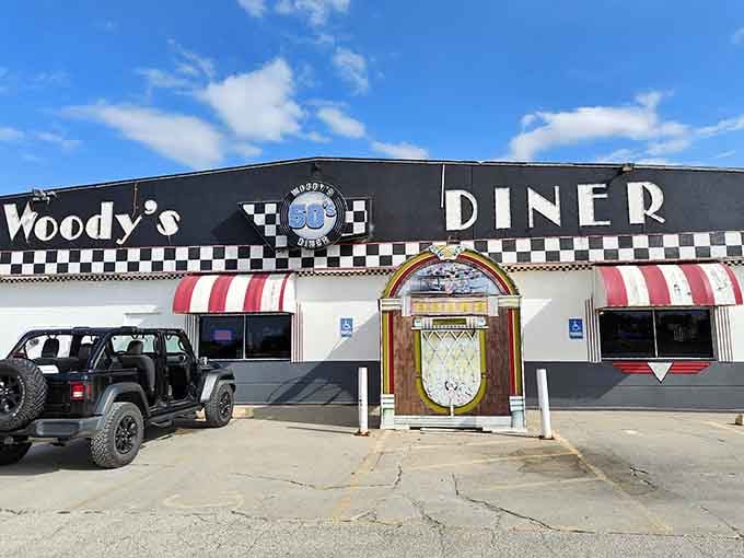 That checkered racing stripe and jukebox entrance aren't just decoration&mdash;they're a promise of deliciousness to come.