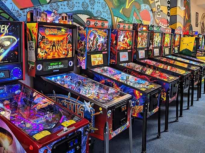 A battalion of pinball machines standing at attention, ready to deliver joy one silver ball at a time.