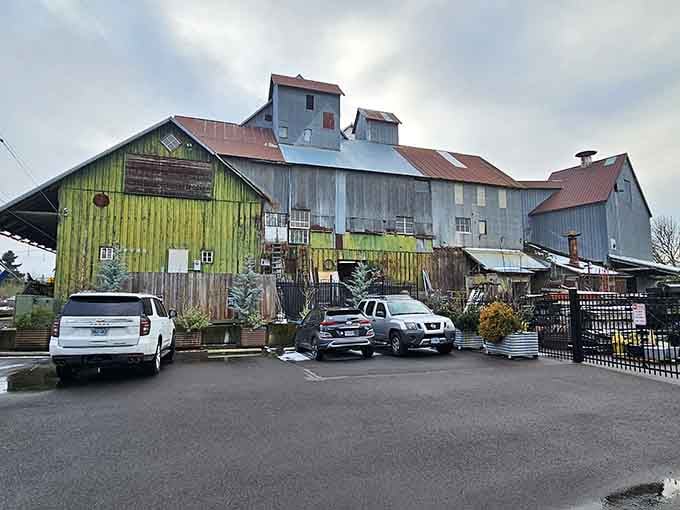 The weathered exterior of Aurora Mills promises adventure, with its patchwork of corrugated metal telling decades of Oregon stories.