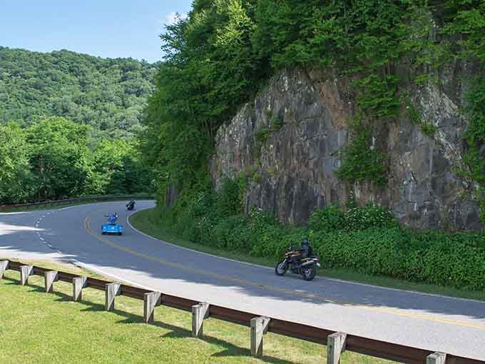 When motorcycles and convertibles share the same dream, you get smooth curves hugging ancient rock faces like old friends.