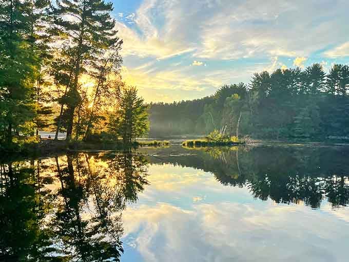 When the lake mirrors the sky this perfectly, you've officially entered the relaxation zone.