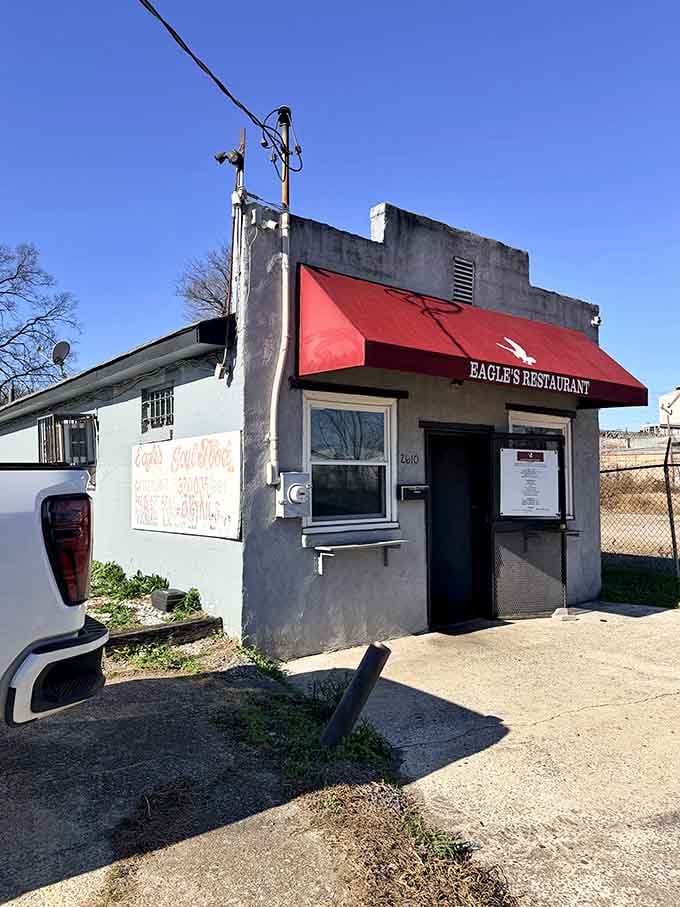 That red awning isn't just decoration, it's a beacon calling hungry souls to salvation one plate at a time.