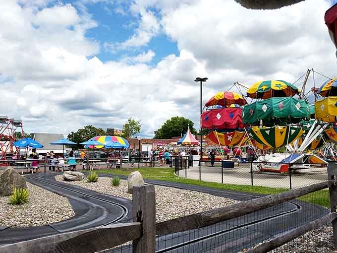 The colorful chaos of classic amusement park rides proves that happiness doesn't require a billion-dollar budget.