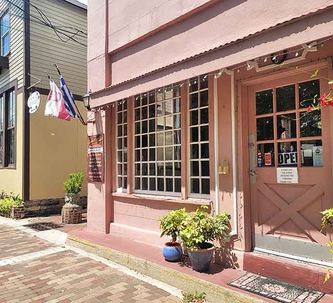 The charming storefront with its grid windows and potted plants whispers "cozy European caf&eacute;" while somehow delivering Polish pierogies that'll ruin you for life.