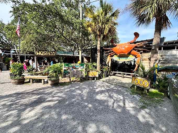 That giant crab entrance isn't just whimsical decor; it's a delicious promise of what awaits inside those weathered walls.