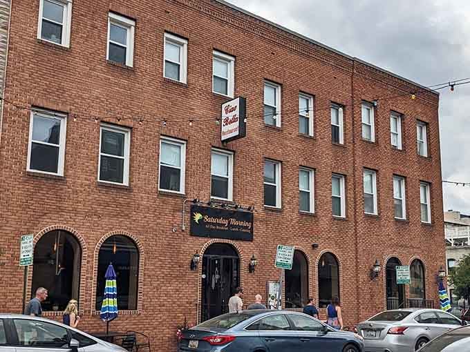 That classic brick facade hides Baltimore's best-kept breakfast secret, and those arched doorways are your gateway to morning glory.