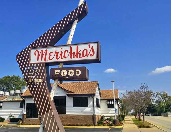 That towering retro sign isn't just decoration, it's a delicious promise pointing you toward po' boy paradise.