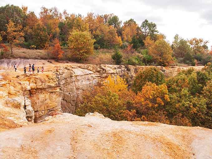 Fall colors frame these ancient rocks like nature's own picture frame, proving Illinois has serious scenic game.