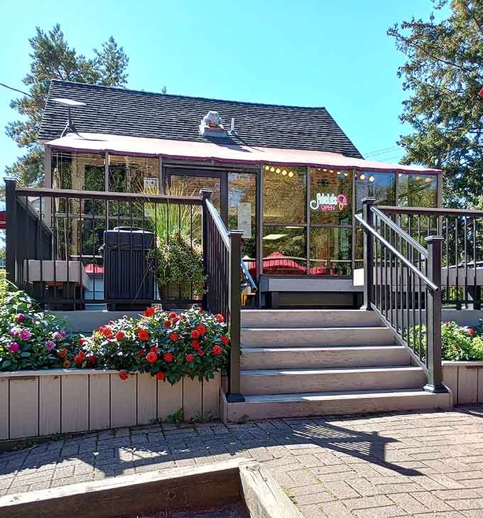 Those flower boxes and welcoming steps lead to frozen custard paradise, where summer memories are made one creamy cone at a time.