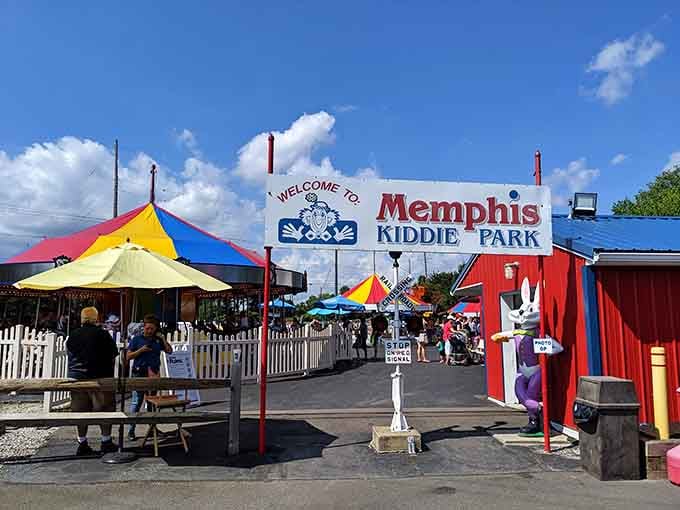 That cheerful entrance sign and those rainbow umbrellas promise the kind of simple joy we all remember from childhood.