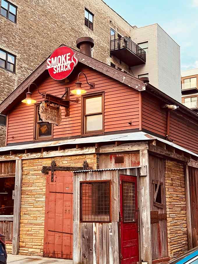That rustic red door isn't just an entrance, it's a portal to barbecue bliss in downtown Milwaukee.