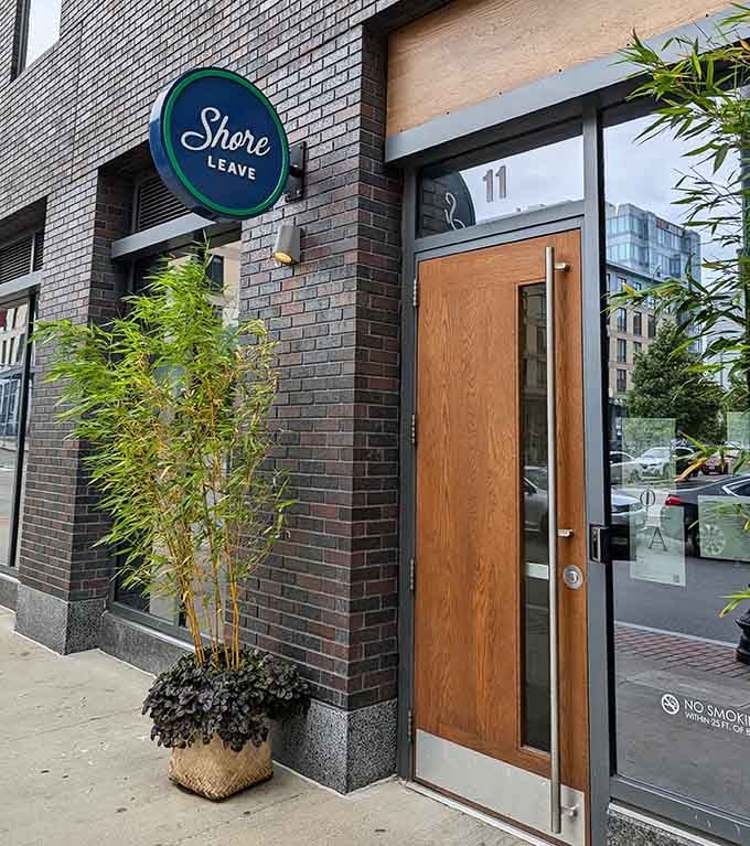 That unassuming entrance is your portal to paradise, proving the best escapes don't need flashy signs.