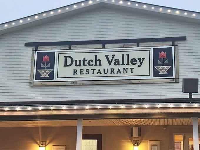 That classic sign flanked by tulip motifs promises the kind of breakfast that'll make you forget your diet exists.