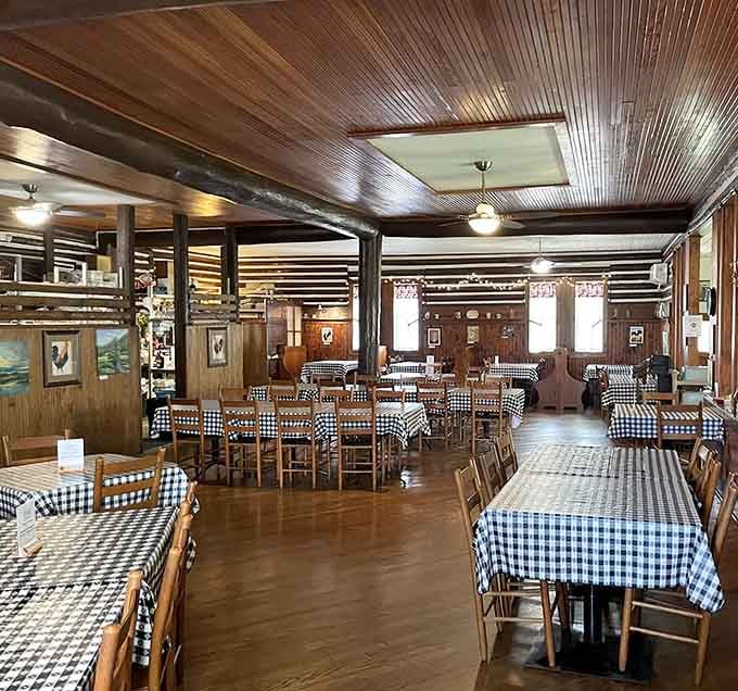 Colonial charm meets comfort food in a dining room where checkered tablecloths signal serious Southern hospitality ahead.