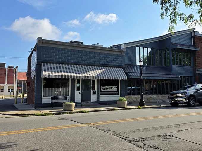 The striped awning and classic storefront hide a secret: Indiana's most obsession-worthy clam chowder lives right here.