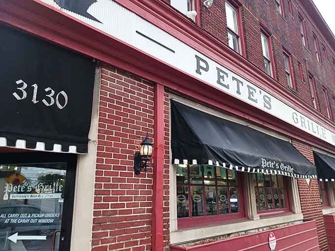 That red brick facade hides Baltimore's breakfast secret better than a magician hides rabbits in hats.