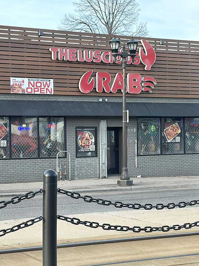 That bold red crab logo isn't just decoration, it's a promise of the buttery chaos awaiting inside.