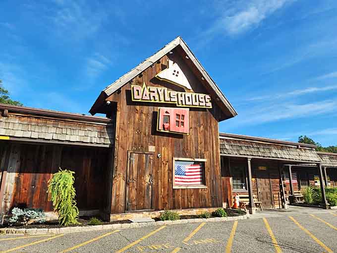 That weathered barn exterior with the American flag isn't fooling anyone, this place serves serious food with soul.