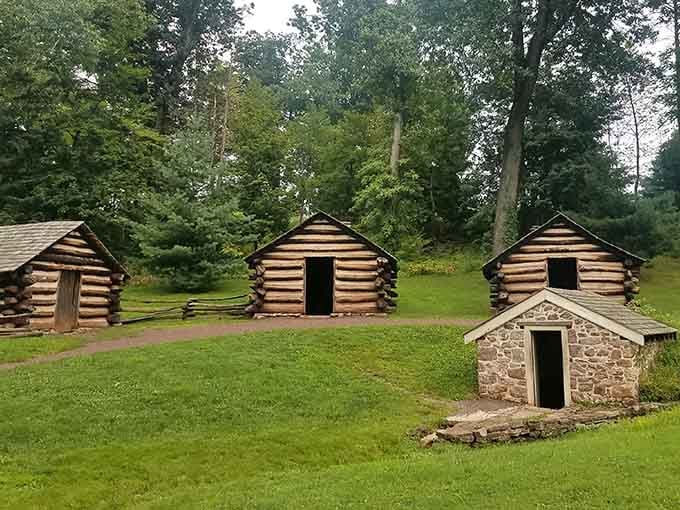 Log cabins and stone shelters nestle into hillsides, silent witnesses to the grit that forged a nation from freezing desperation.