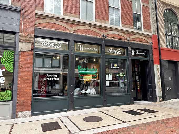 Nestled between brick buildings, this unassuming facade conceals sandwich artistry that'll make you rethink everything you thought about portion control.