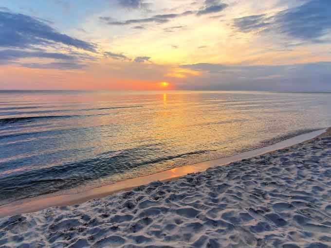 Gentle waves kiss the shoreline as another breathtaking sunset unfolds at North Beach Park, creating the perfect end to your beach day.
