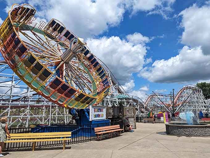 Stricker's Grove showcases its colorful Electric Rainbow ride with those magnificent wooden coasters creating the perfect backdrop.
