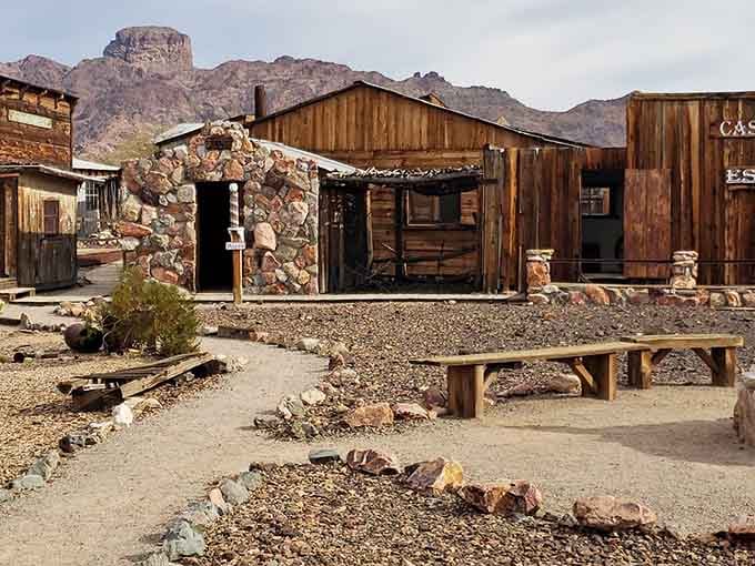 Rustic buildings stand against that iconic dome-shaped peak, creating a postcard that Instagram filters could never improve.