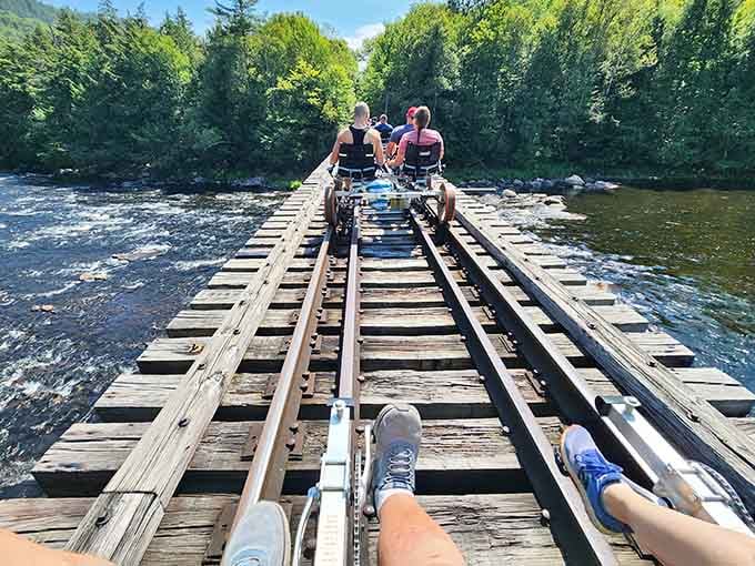 Pedaling across a river trestle on railroad tracks feels like something from a childhood dream come true.