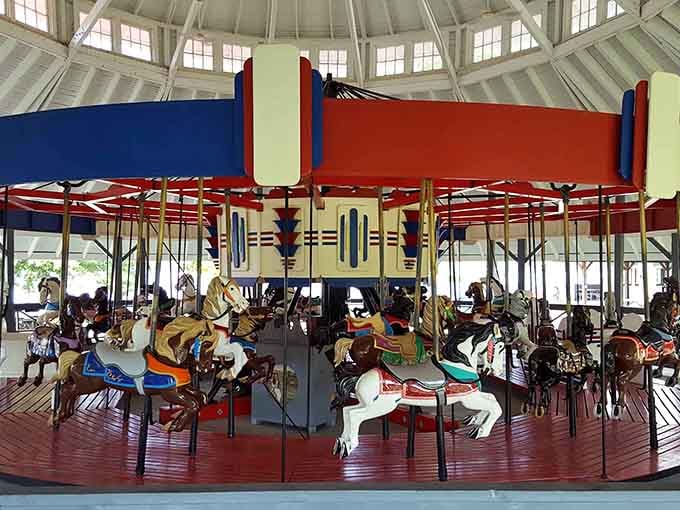 Hand-carved wooden horses gleaming under that classic pavilion roof, this carousel has been spinning joy since your grandparents were kids.