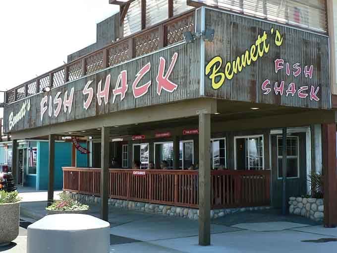 Hand-painted letters on rustic wood tell you everything you need to know: this place cares more about what's on your plate than Instagram-worthy decor.