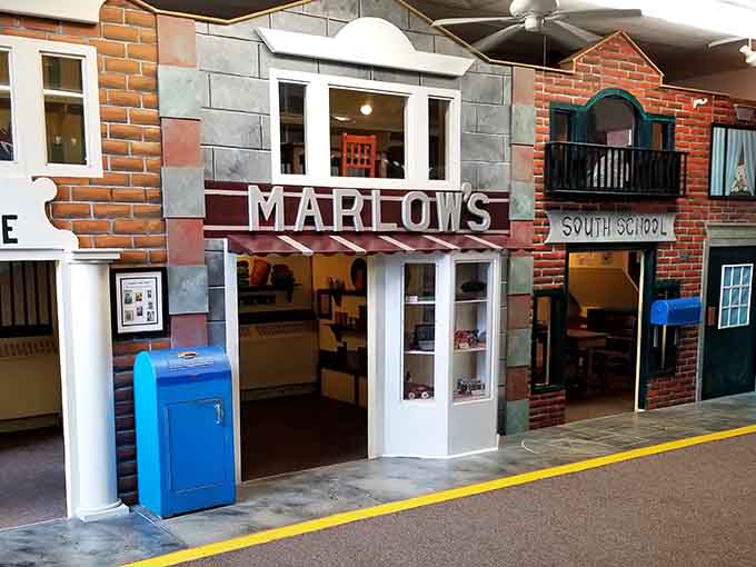 Step into a miniature Main Street where kids run their own shops, complete with that bright blue mailbox.
