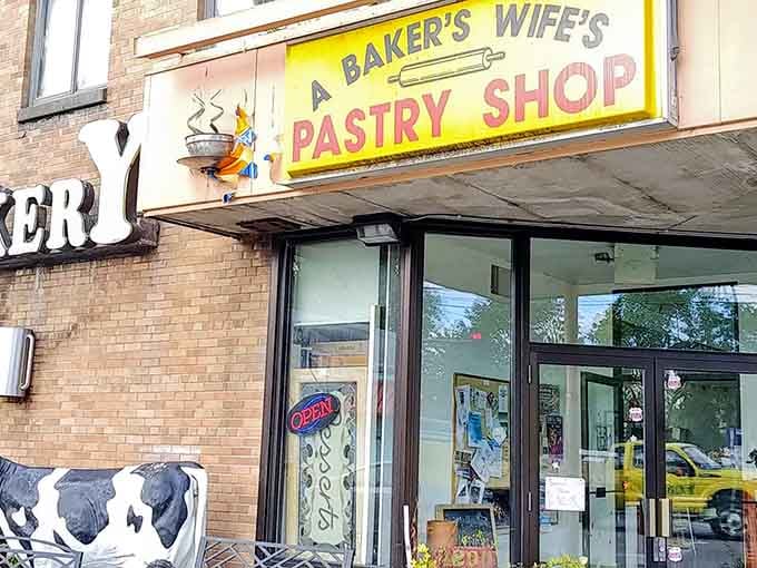 The cheerful signage practically sings from the brick building, promising pastries that'll make you forget every diet you've ever attempted.