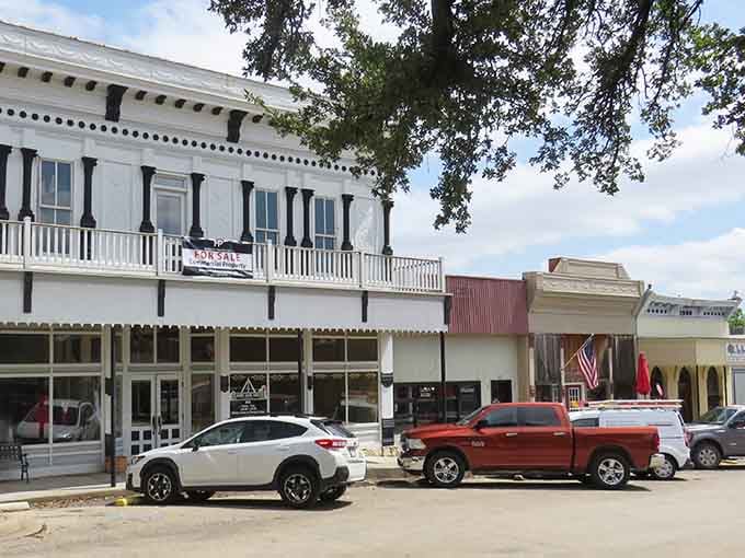 Historic storefronts line the street, proving that charm doesn't require a corporate redesign every five years.