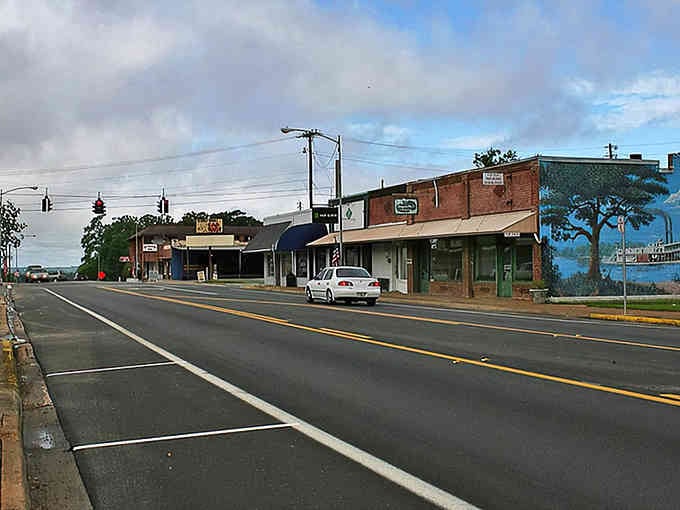 Classic storefronts line streets where parking is always available and nobody honks at you for existing.