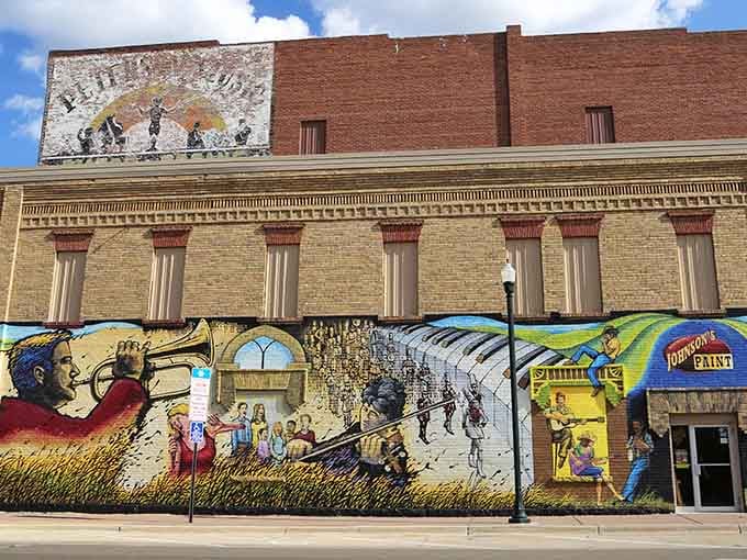 Vibrant murals celebrate community history without charging admission fees that require taking out loans first.