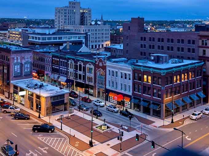 When the streetlights flicker on, downtown transforms into something special, like finding out your quiet neighbor plays jazz piano.