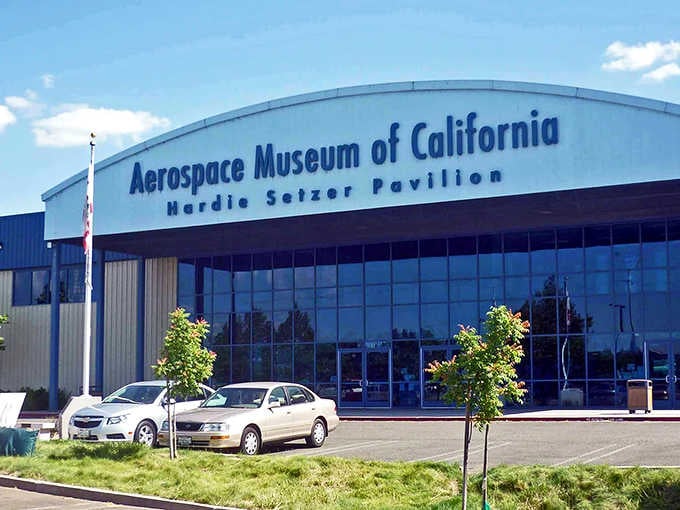 Under sunny California skies, the museum's modern entrance stands ready to transport you through decades of flight history.