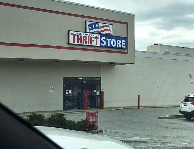 The patriotic storefront promises treasures within, where your shopping cart becomes a vessel of infinite possibilities.