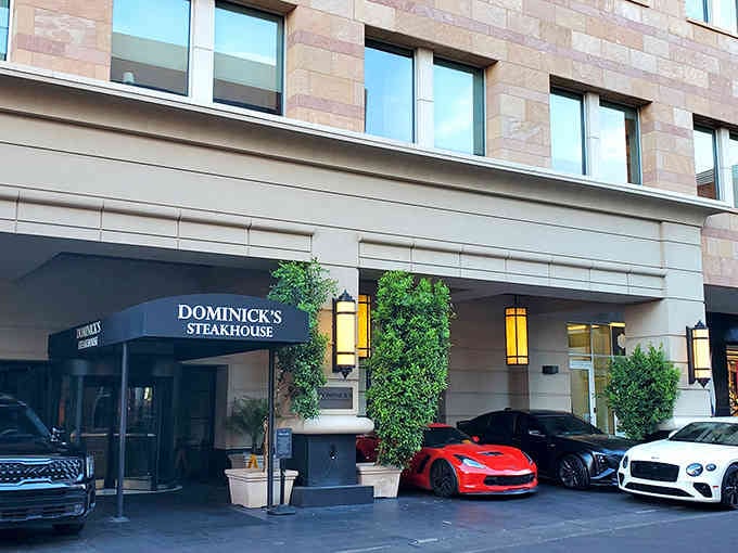 The entrance promises luxury, and those luxury cars parked outside suggest the secret's already out about this place.