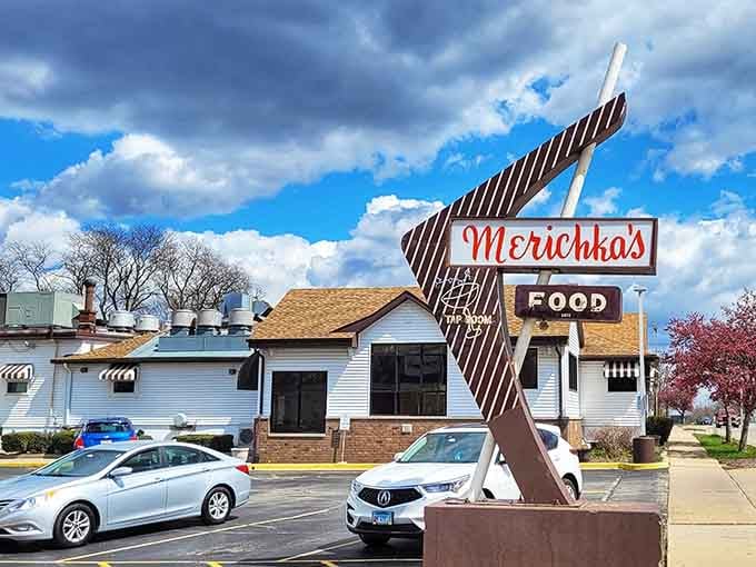 That vintage sign has been guiding hungry travelers to exceptional food longer than most restaurants have existed.