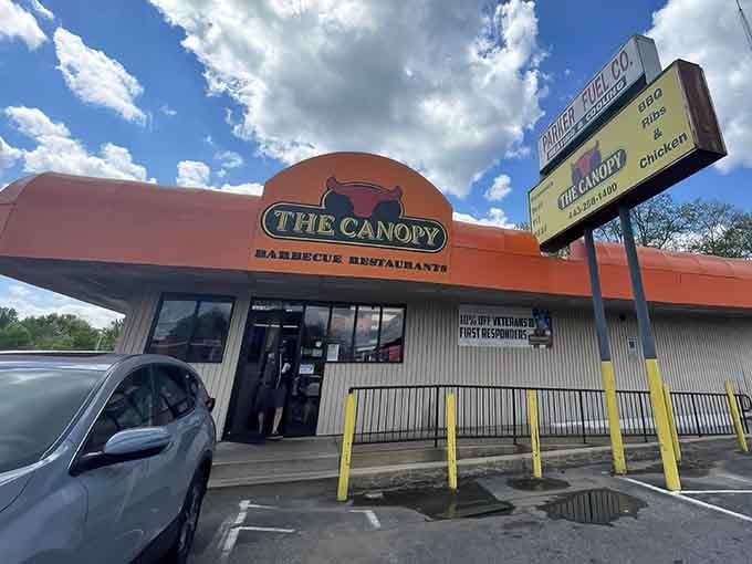 That orange canopy isn't just architectural flair, it's a beacon guiding hungry souls to barbecue salvation.