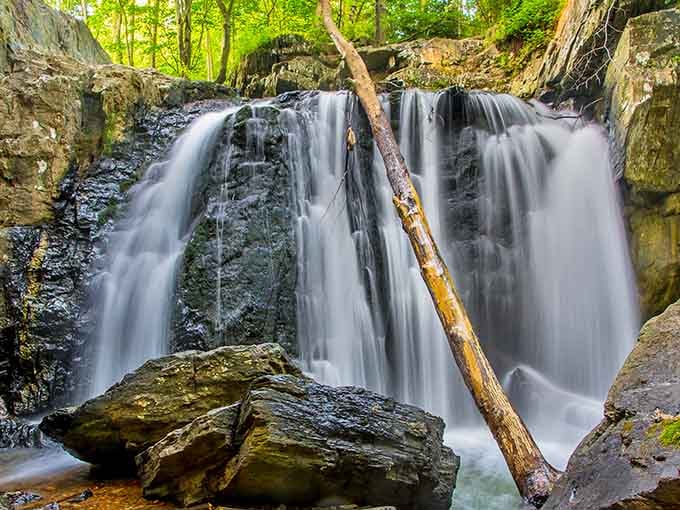 Silky ribbons of water tumble over weathered stone, creating the kind of peaceful soundtrack that makes you forget your phone exists.