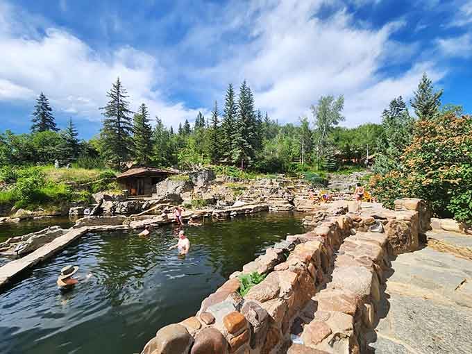 Natural stone pools cascading through pine forests prove Mother Nature has better design skills than any luxury spa architect ever will.