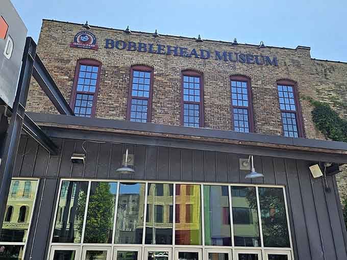 That brick facade has seen some things, but nothing quite as delightfully absurd as housing thousands of bobbleheads.