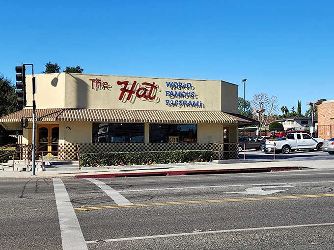This corner location has been luring hungry souls with that glorious sign for longer than most restaurants survive.