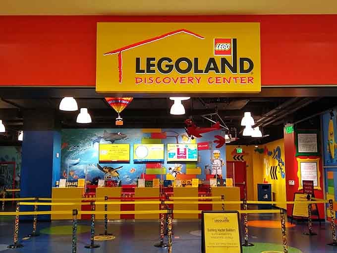 The entrance beckons families into a world where stepping on bricks is actually encouraged for once.